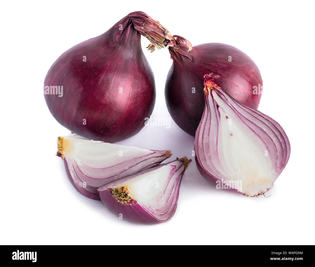 Two red onions and one onion cut on white background Stock Photo - Alamy