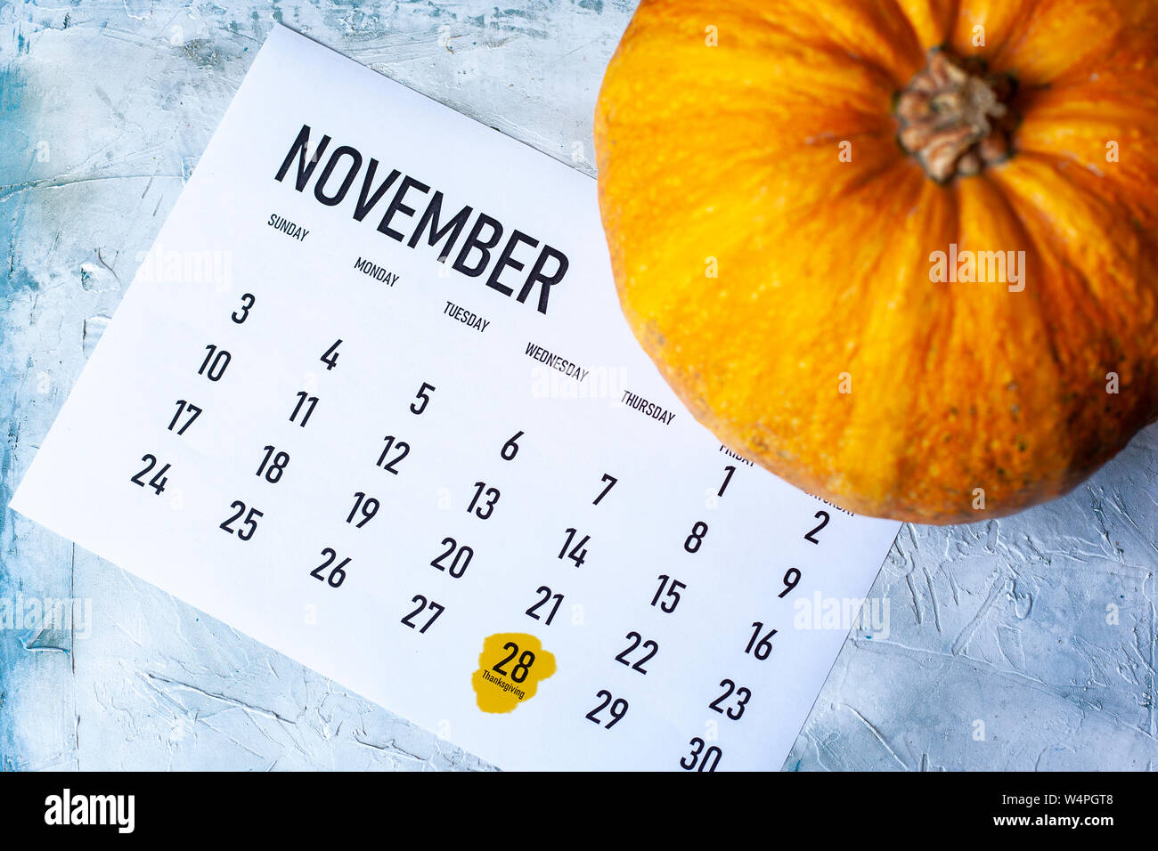 Simple 2019 November monthly calendar on table with a pumpkin ...