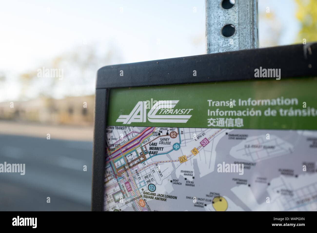 Close-up of map with logo for AC Transit bus system at a bus stop on ...