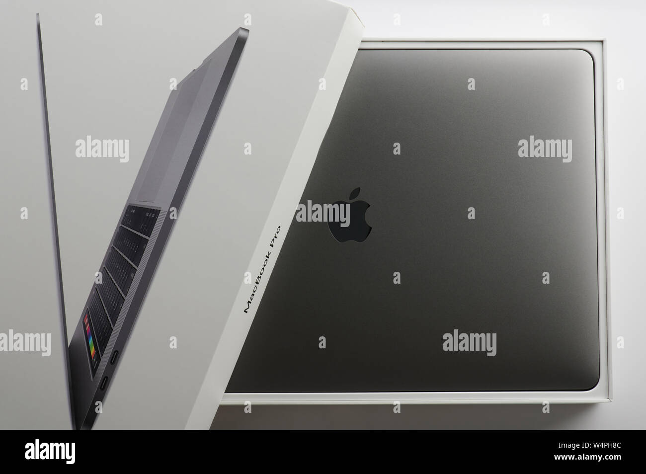 New york, USA - july 24, 2019: Unboxing new gray apple macbook pro ...