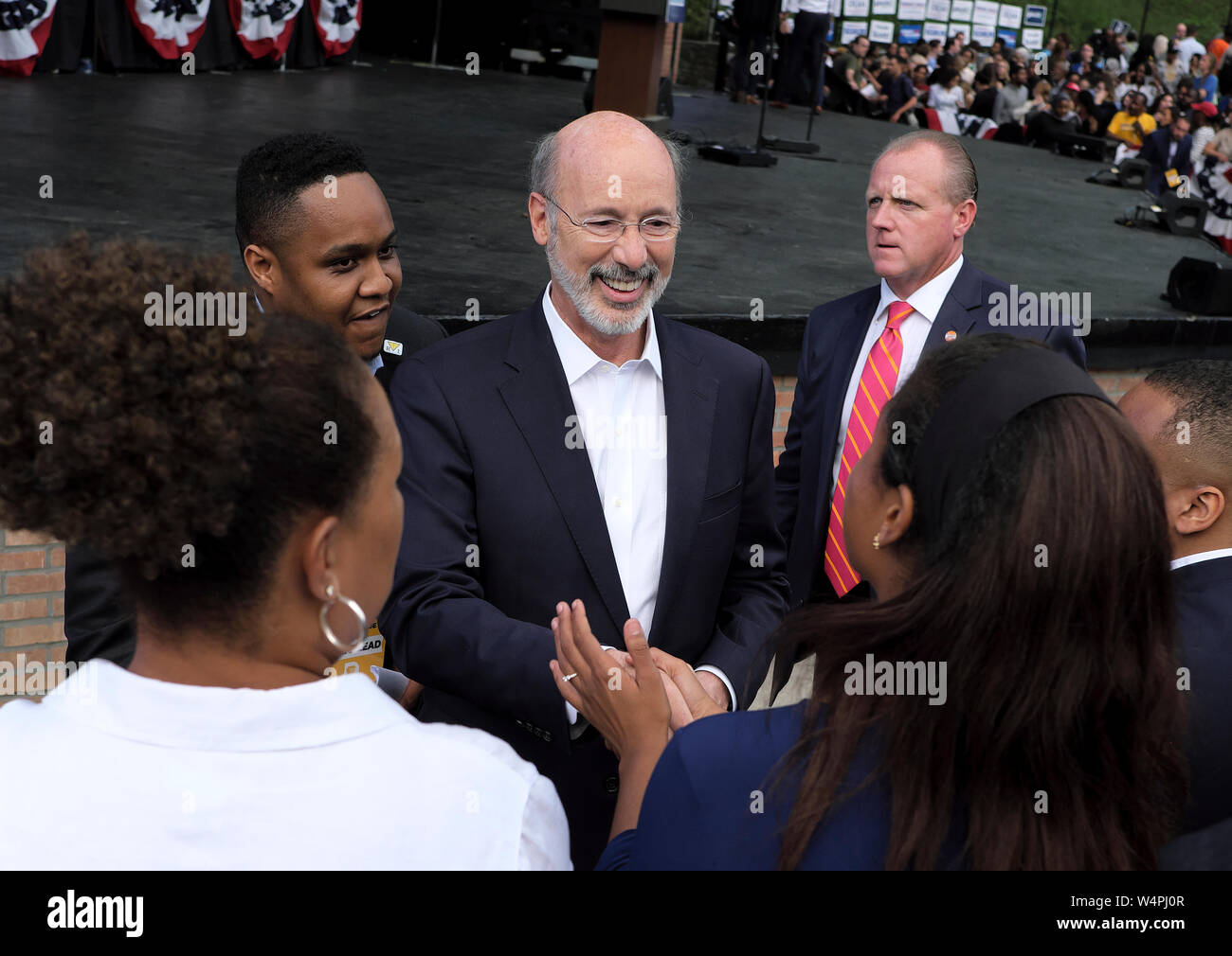 Pennsylvania Governor Tom Wolf interacts with supporters during a rally ...