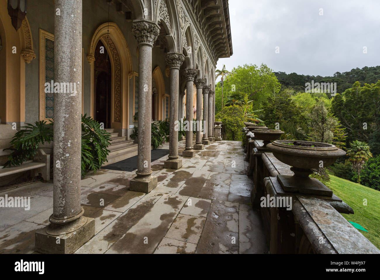 Covered teraace with pillars overlooking garden at the UNESCO World ...