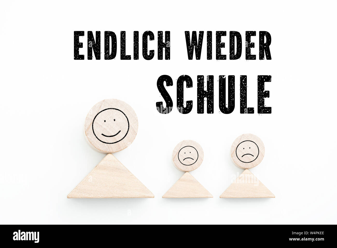 blocks symbolizing parent with kids and the sentence "Back to School ...