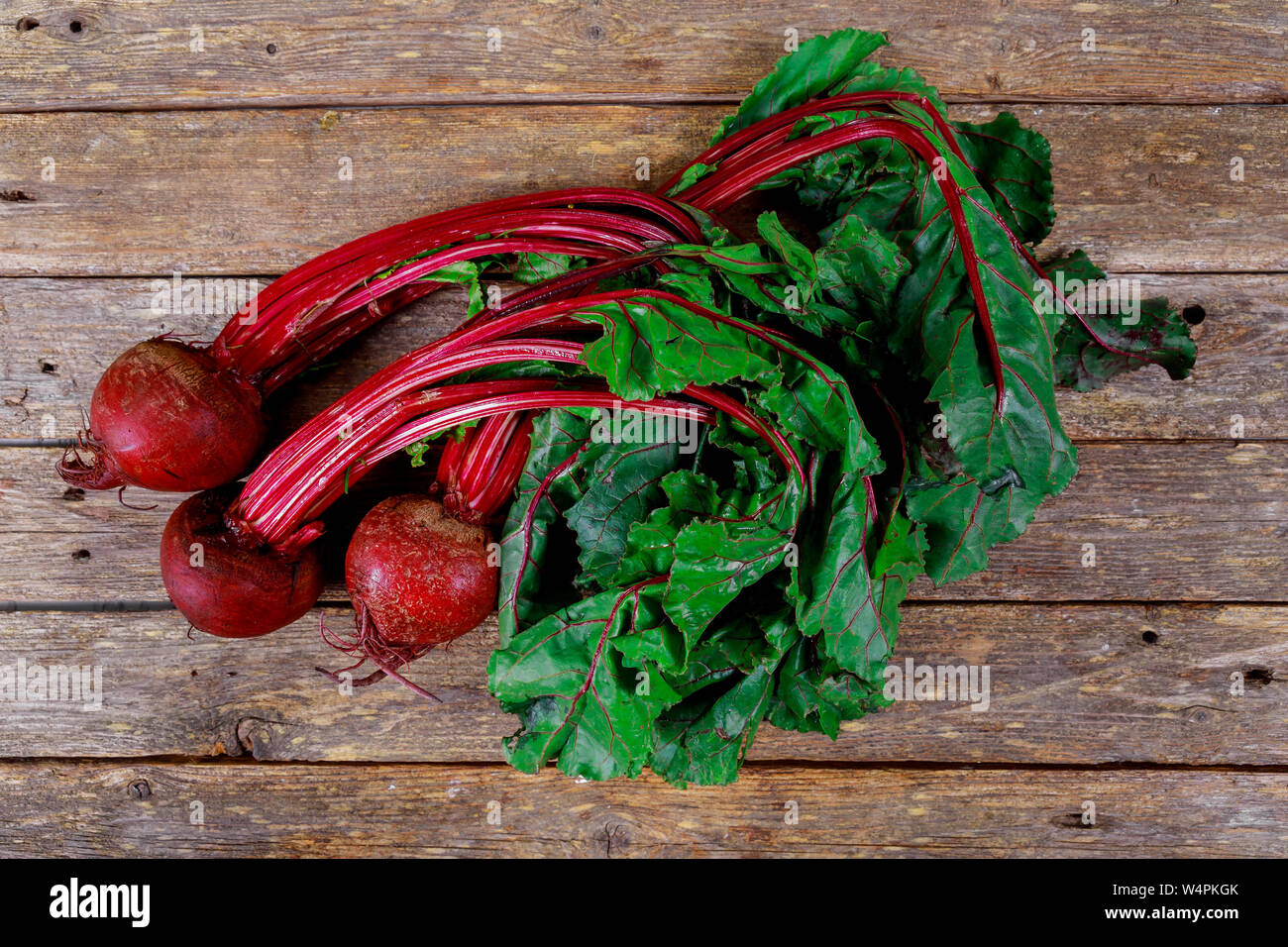 Fresh beet with green beetroot on grey rustic wooden background Stock ...