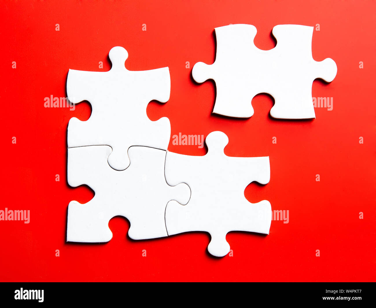 four matching pieces of a puzzle Stock Photo - Alamy