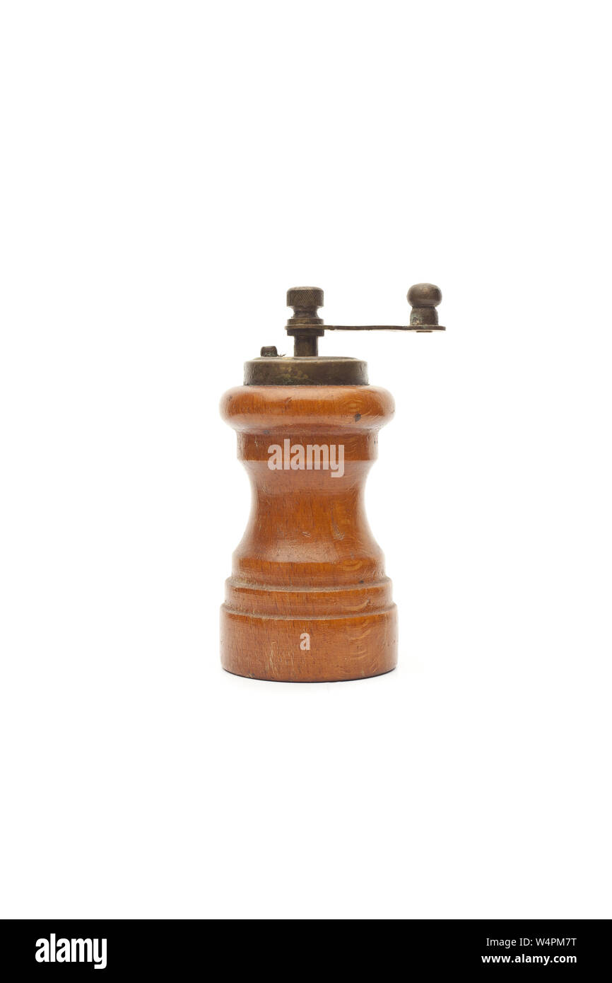 Wooden fancy pepper mill isolated on white background Stock Photo - Alamy