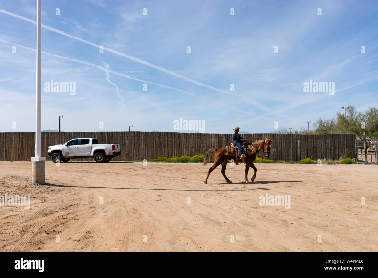 Cowboy riding horse pack horse hi-res stock photography and images - Alamy