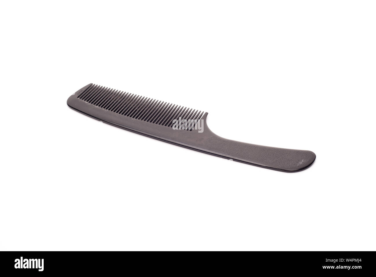 Black comb isolated on white background Stock Photo - Alamy