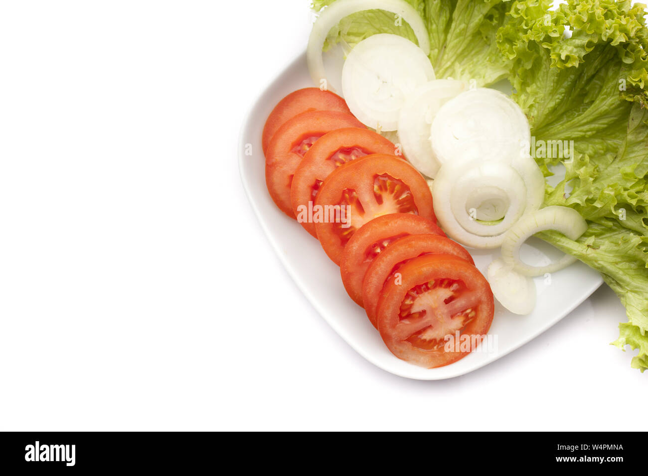 fresh vegetables in plate isolated on white background Stock Photo - Alamy