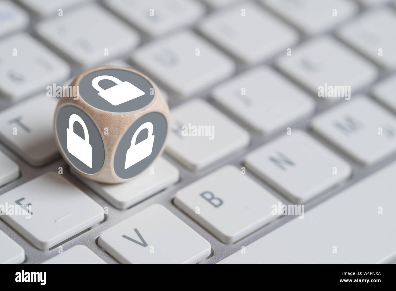cube with lock symbols on a keyboard Stock Photo - Alamy