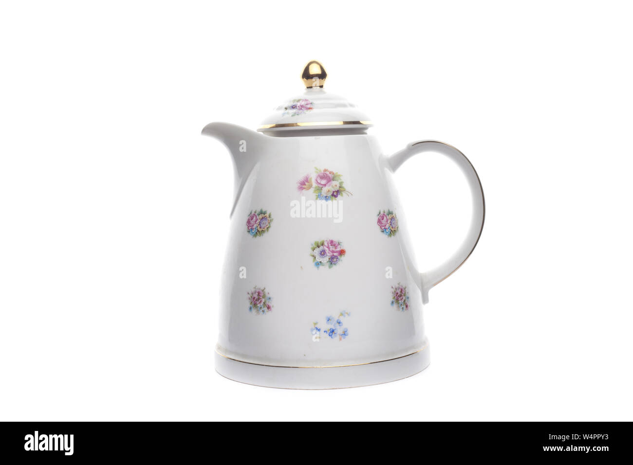 Porcelain tea jug with ornament isolated on white Stock Photo - Alamy