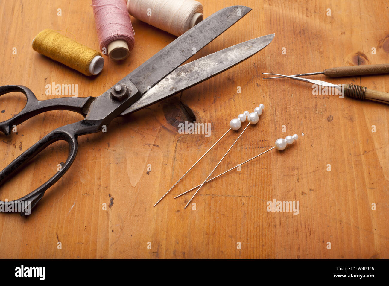 dressmaker shears with spool of threads, Crochet tool craft concept on ...