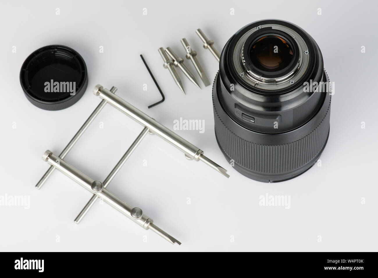 Metal wrench tool for cleaning lens isoalted on white background Stock ...