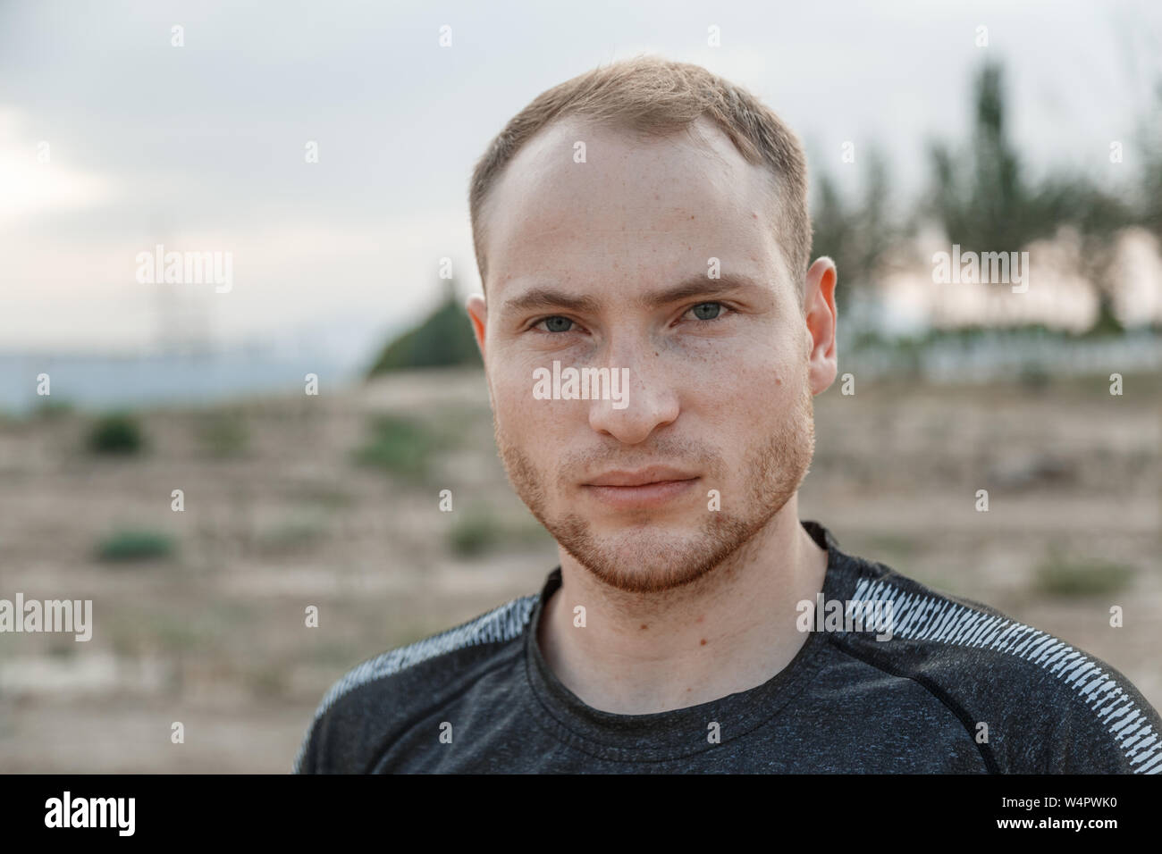 Blond gorgeous young man portrait hi-res stock photography and images ...