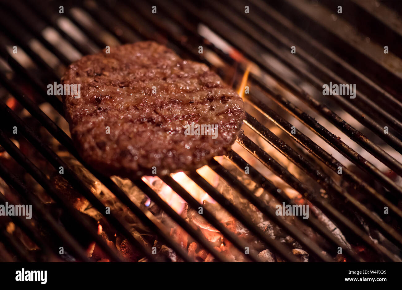 Assorted delicious grilled meat over the coals on barbecue Stock Photo ...
