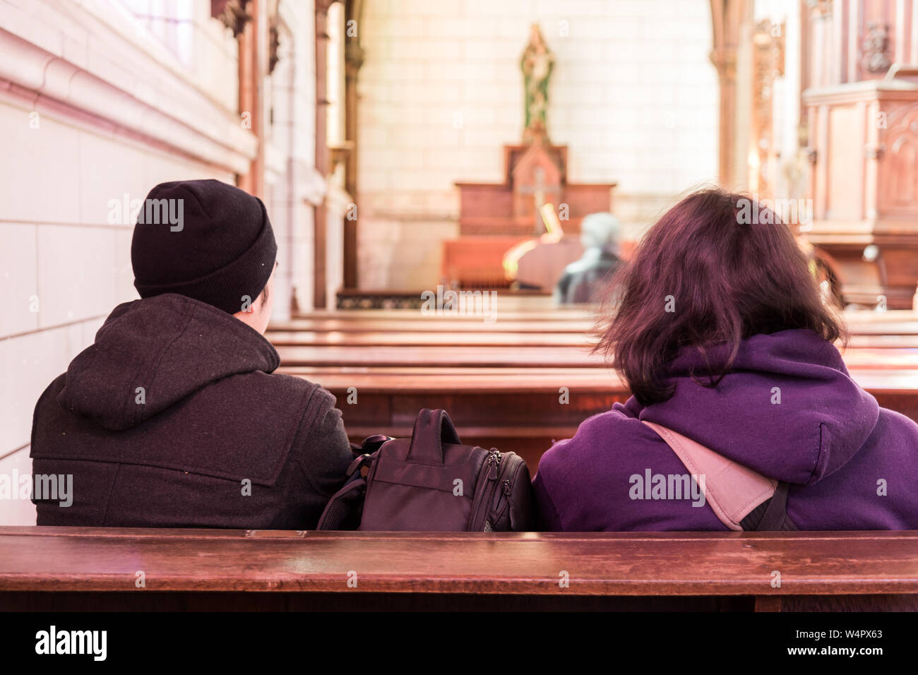 Christian family praying in church hi-res stock photography and images ...