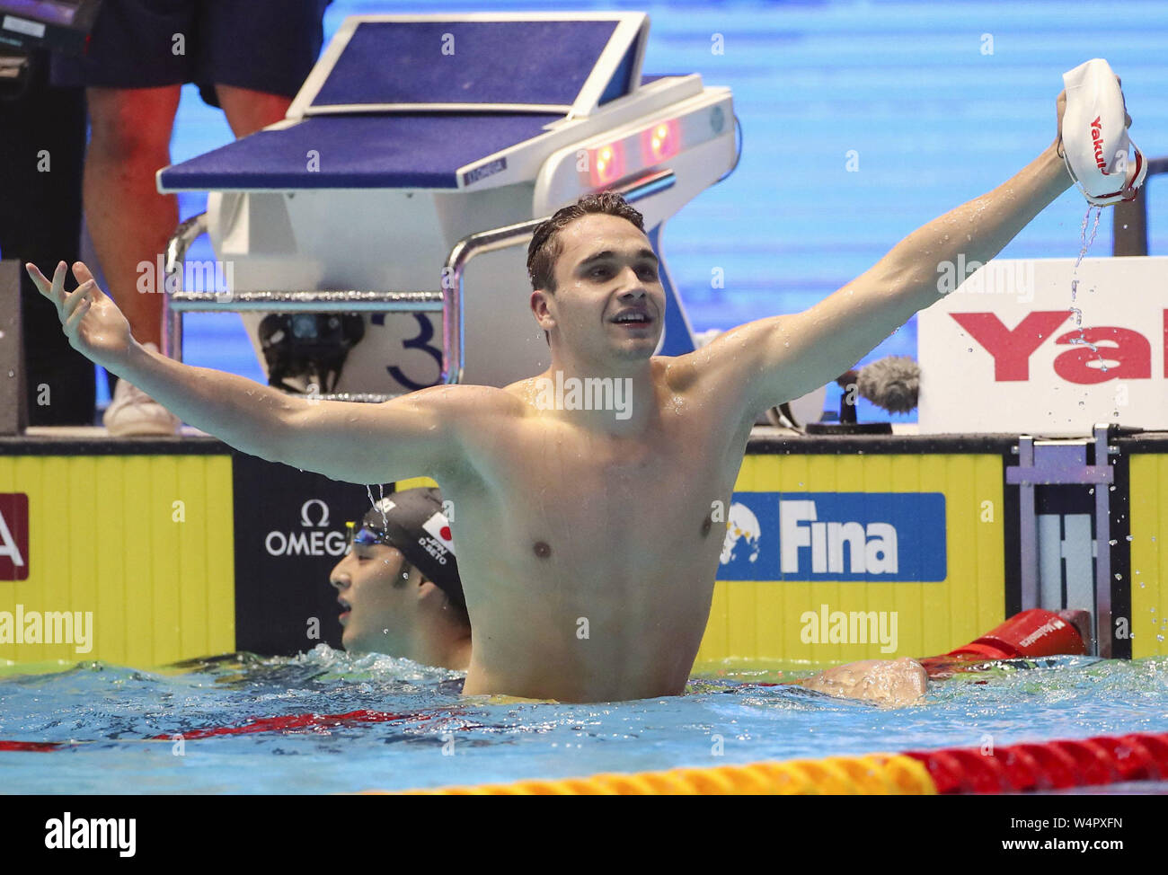 Hungary's Kristof Milak celebrates after setting a world record of 1 ...