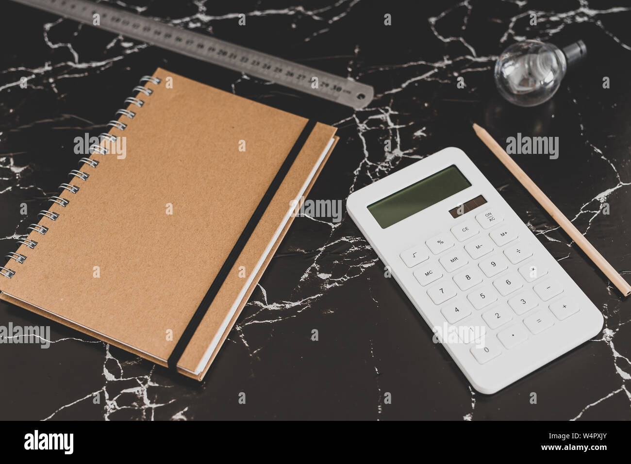 back to work concept: desk with mixed stationery items and notebook for ...