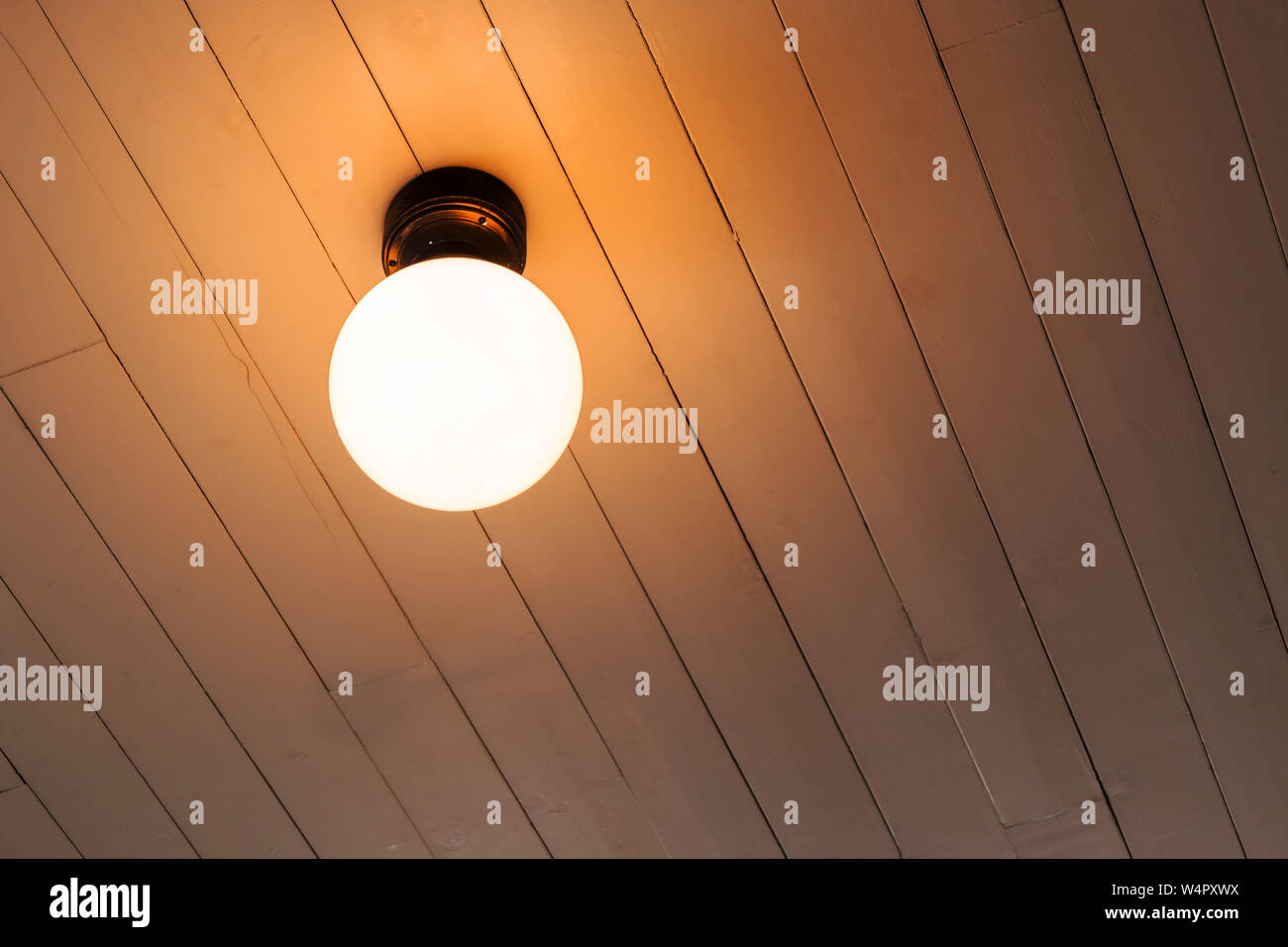 single lamp light on the ceiling room Stock Photo - Alamy