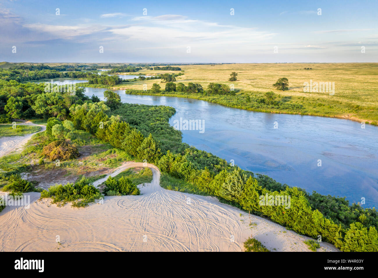 shallow and wide Dismal River meandering trough Nebraska Sandhills at ...