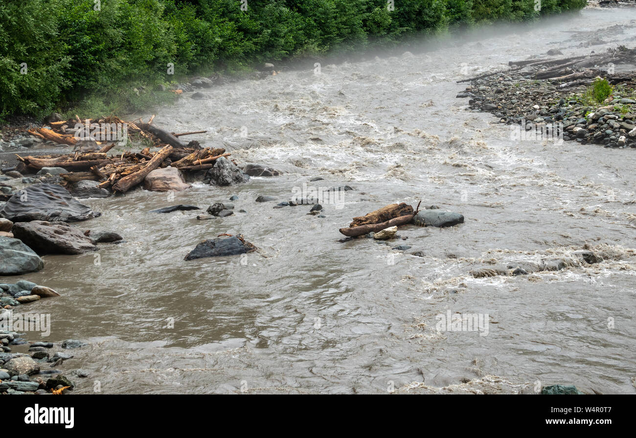 The powerful flow of a mountain river in the spring. Spring flood Stock ...