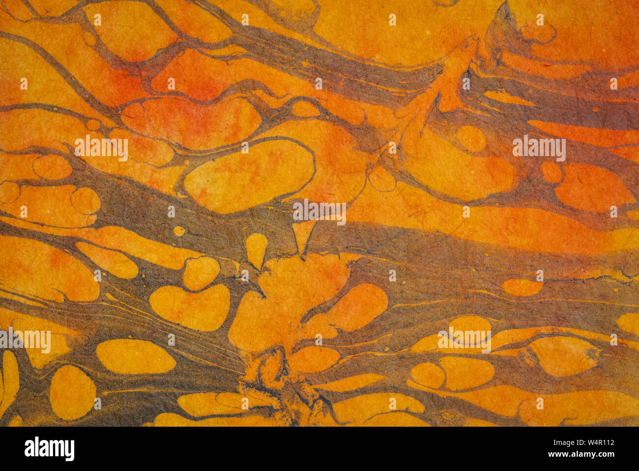 background of textured handmade Thai marbled momi mulberry paper with ...