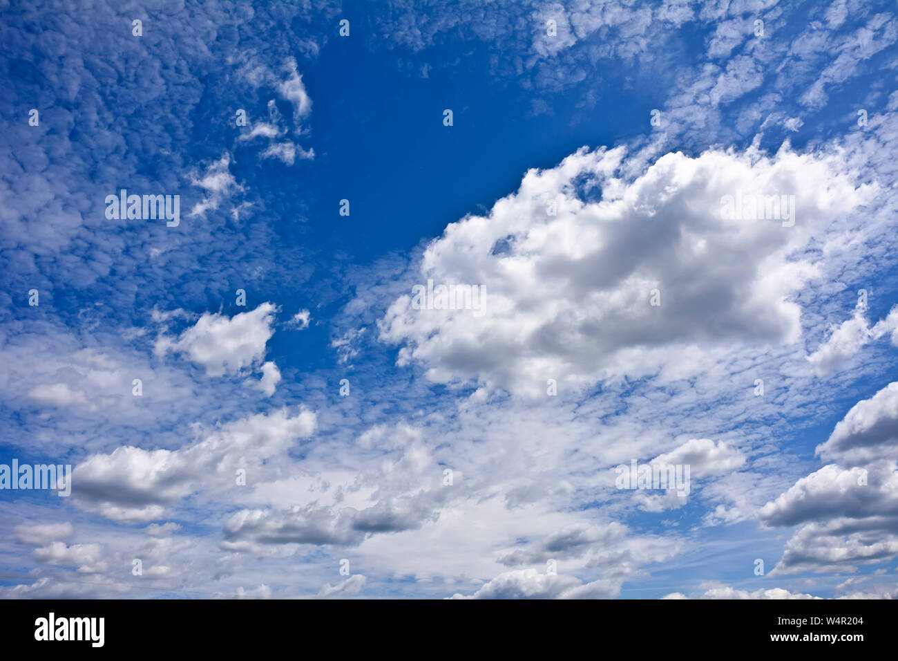 Landscape with clouds in the blue sky Stock Photo - Alamy