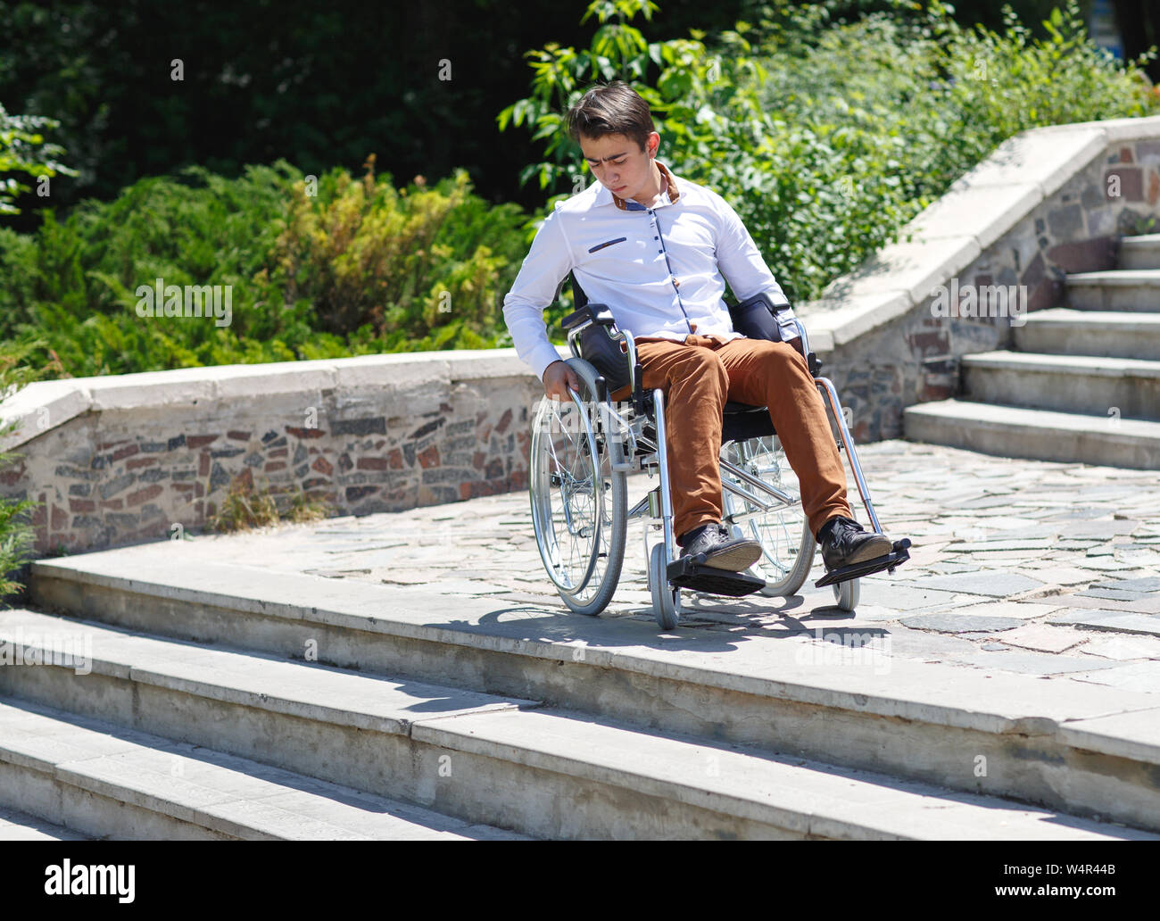 Accessibility disabled helpless wheelchair hi-res stock photography and ...