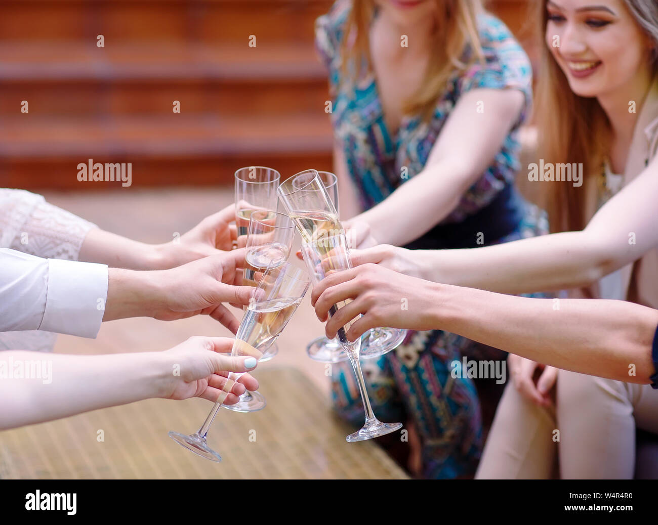 Celebration. People holding glasses of champagne making a toast Stock ...