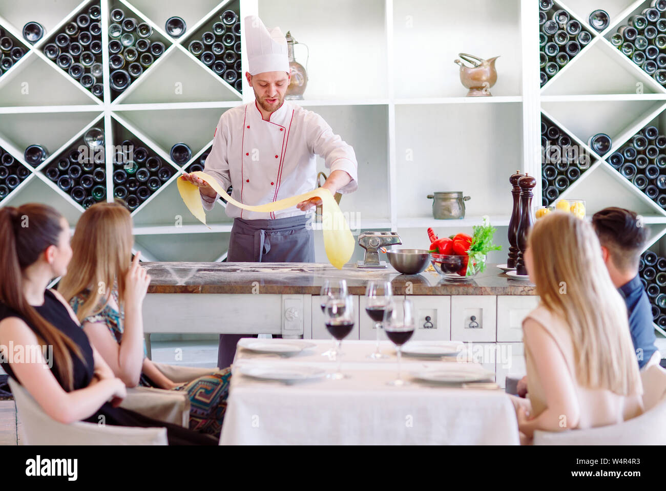 The chef prepares the paste for the visitors Stock Photo - Alamy