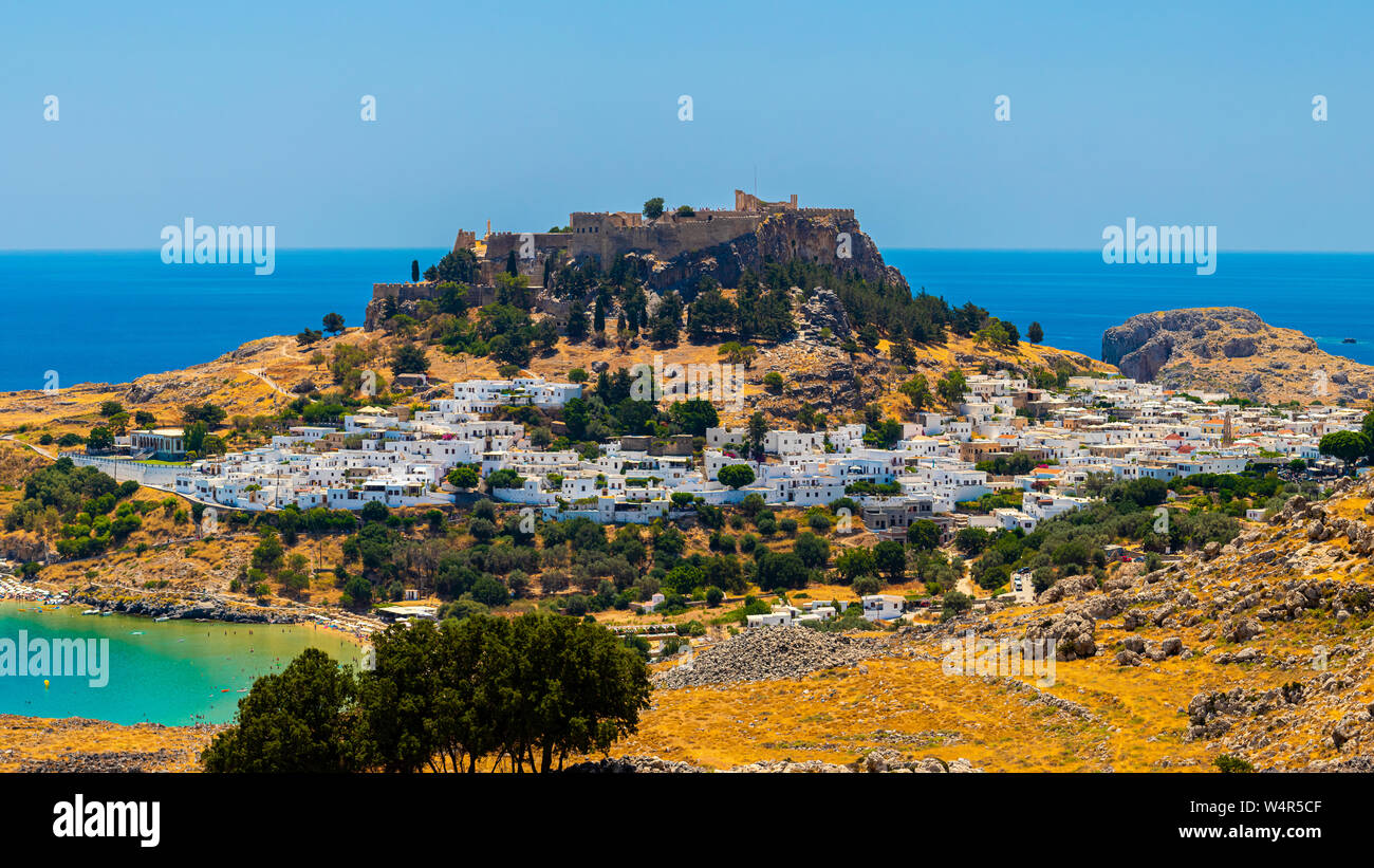 The historic city of Lindos and the Acropolis of Lindos in beautiful ...