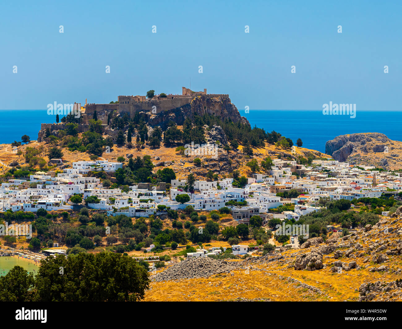 The historic city of Lindos and the Acropolis of Lindos in beautiful ...