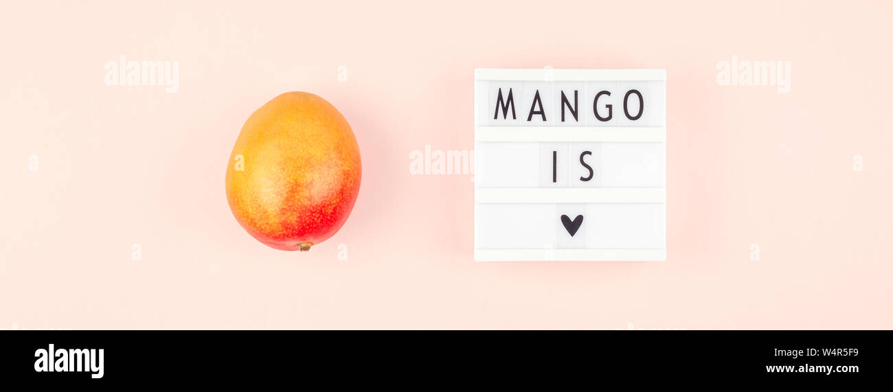 Mango fruit in creative conceptual top view flat lay composition with ...