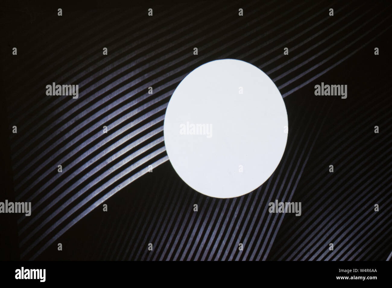 A background image of curved lines and a white circular centre Stock ...