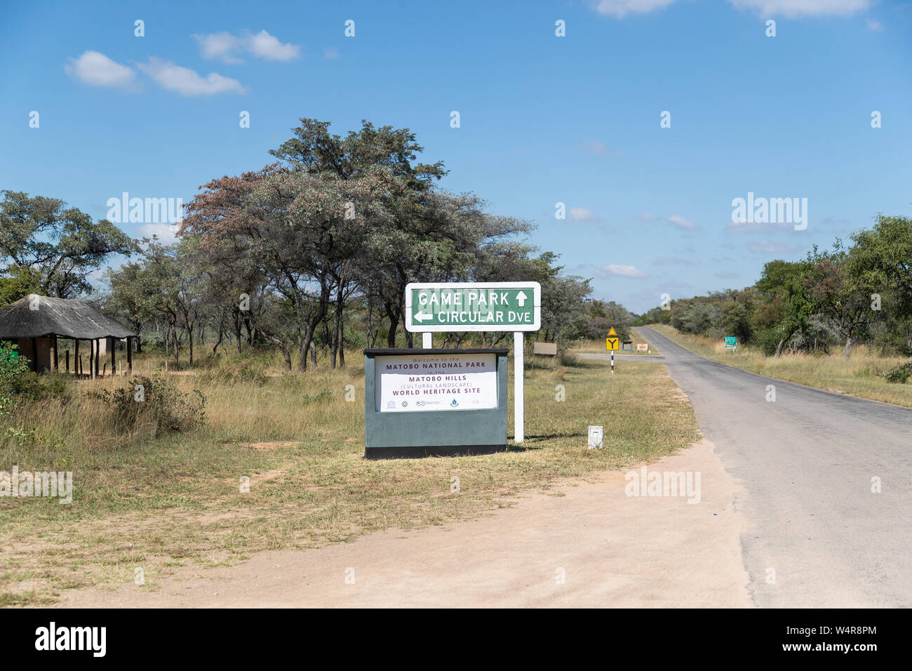 A sign within the entrance to the Matobo National Park with a route for ...