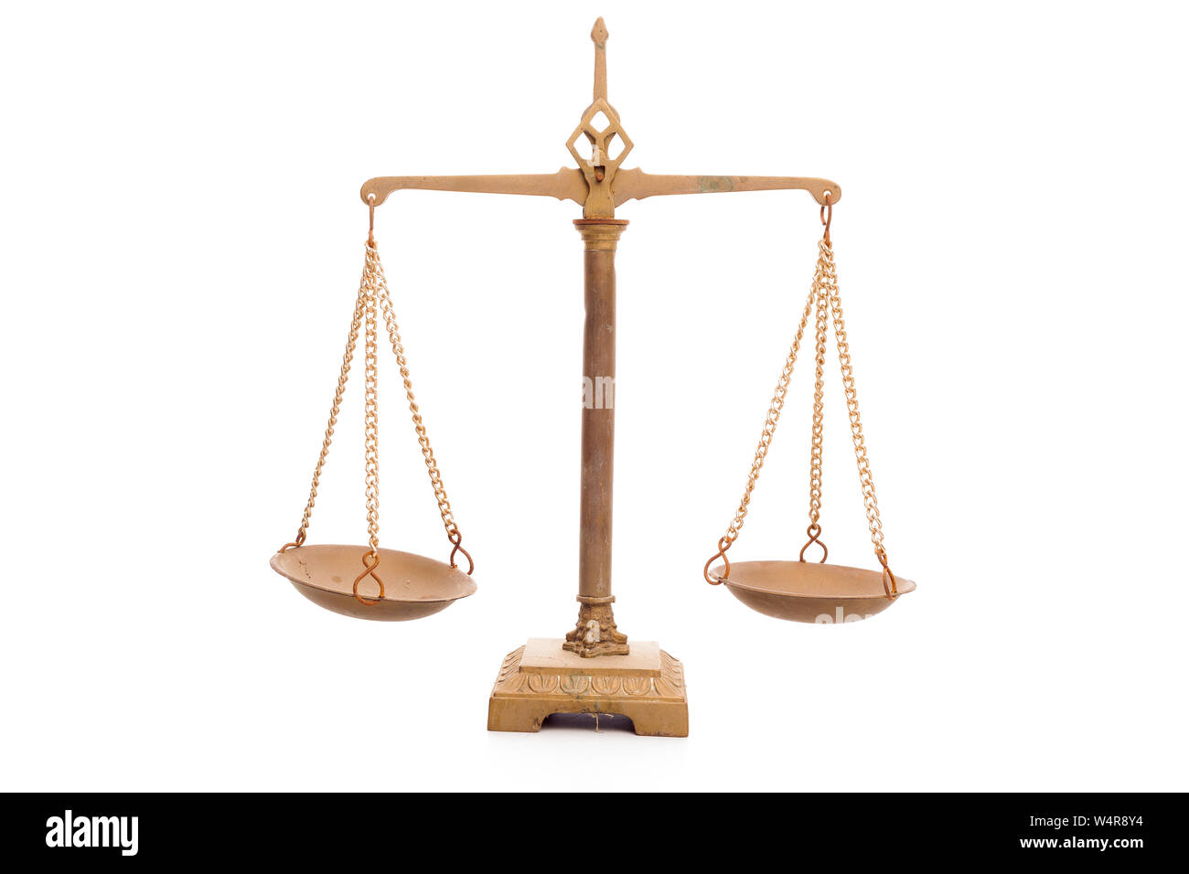 Old antique weight maschine with gold chains solated on white ...