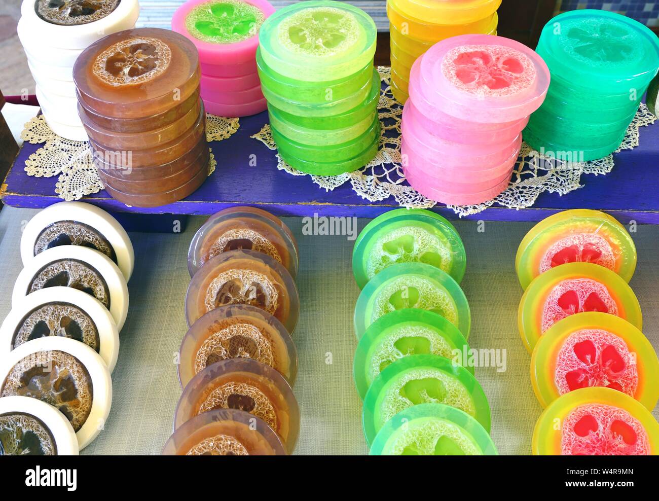 Colorful round soaps made with loofah sponge Stock Photo - Alamy
