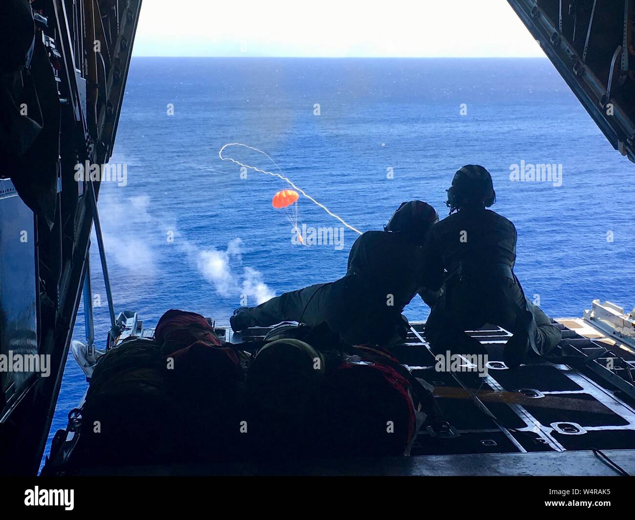The crew of an HC-130 Hercules airplane from U.S. Coast Guard Air ...