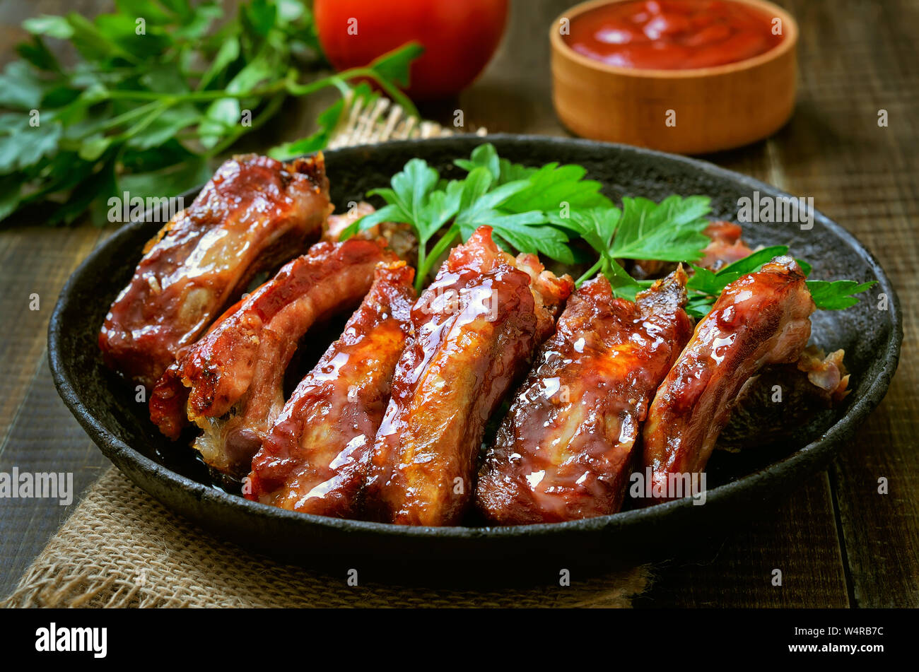 Baked pork ribs in frying hi-res stock photography and images - Alamy