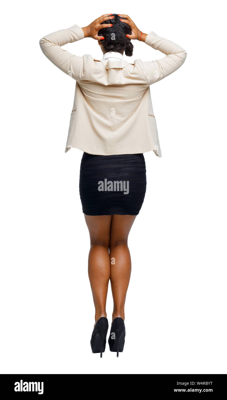 Back view of shocked black business woman. Rear view people collection ...