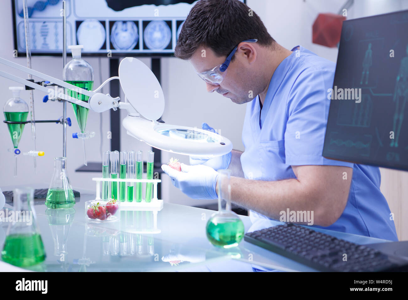 Lab test through glass hi-res stock photography and images - Alamy