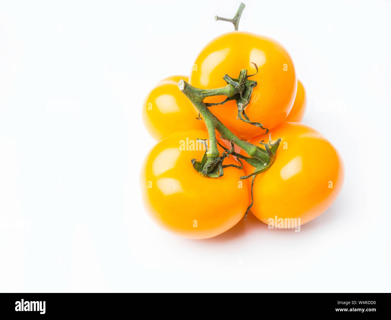 fresh yellow tomatoes on white background with copy space Stock Photo ...