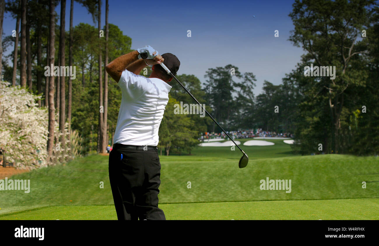 man golfer in action on a golf course Stock Photo - Alamy