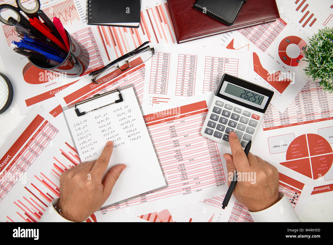 Business reports, data tables and charts - directly above view of ...