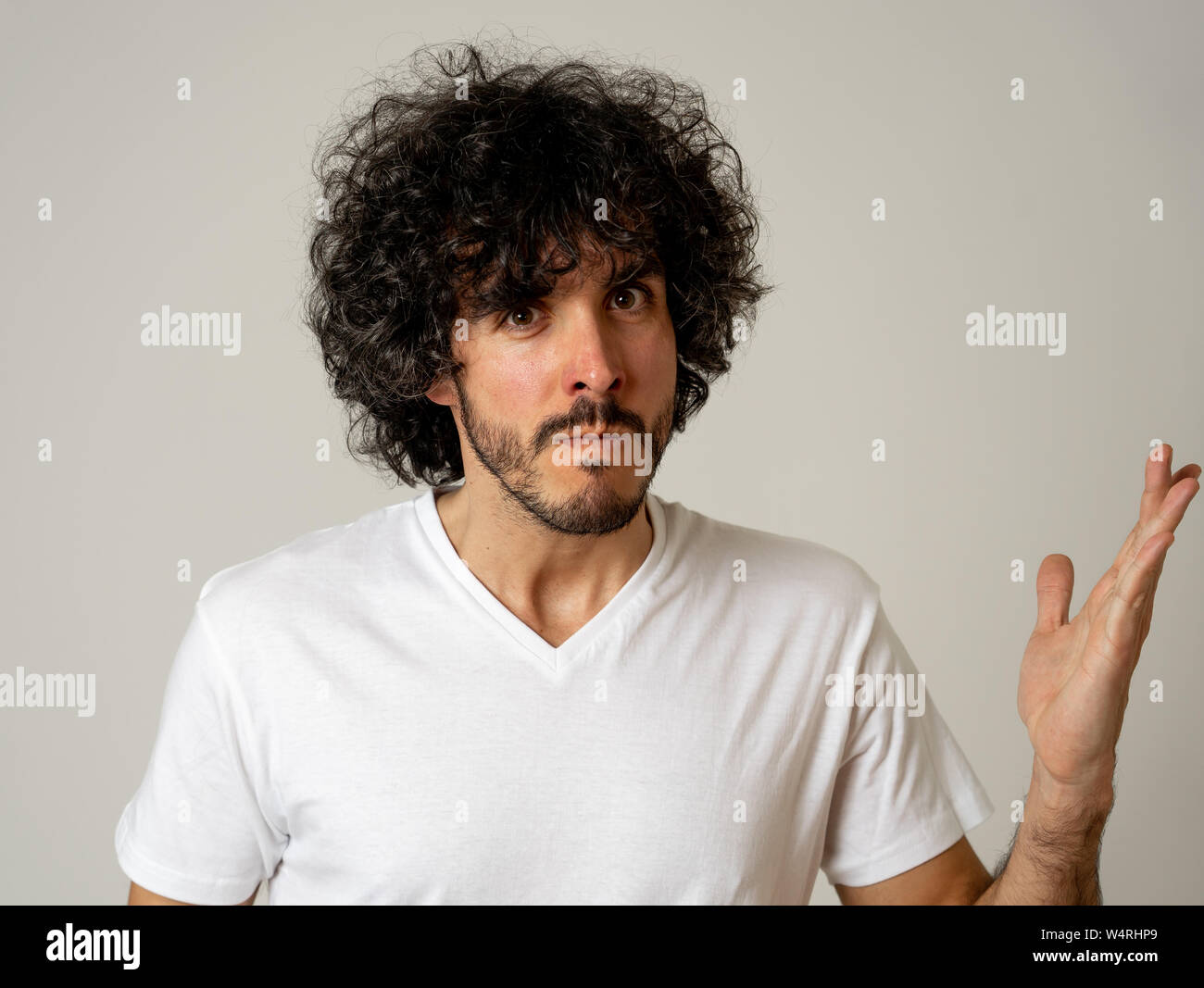 Annoyed young millennial man with an angry face looking mad and furious ...