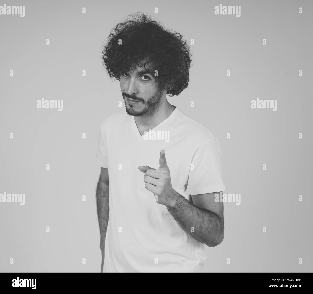 Advert happy man pointing Black and White Stock Photos & Images - Alamy