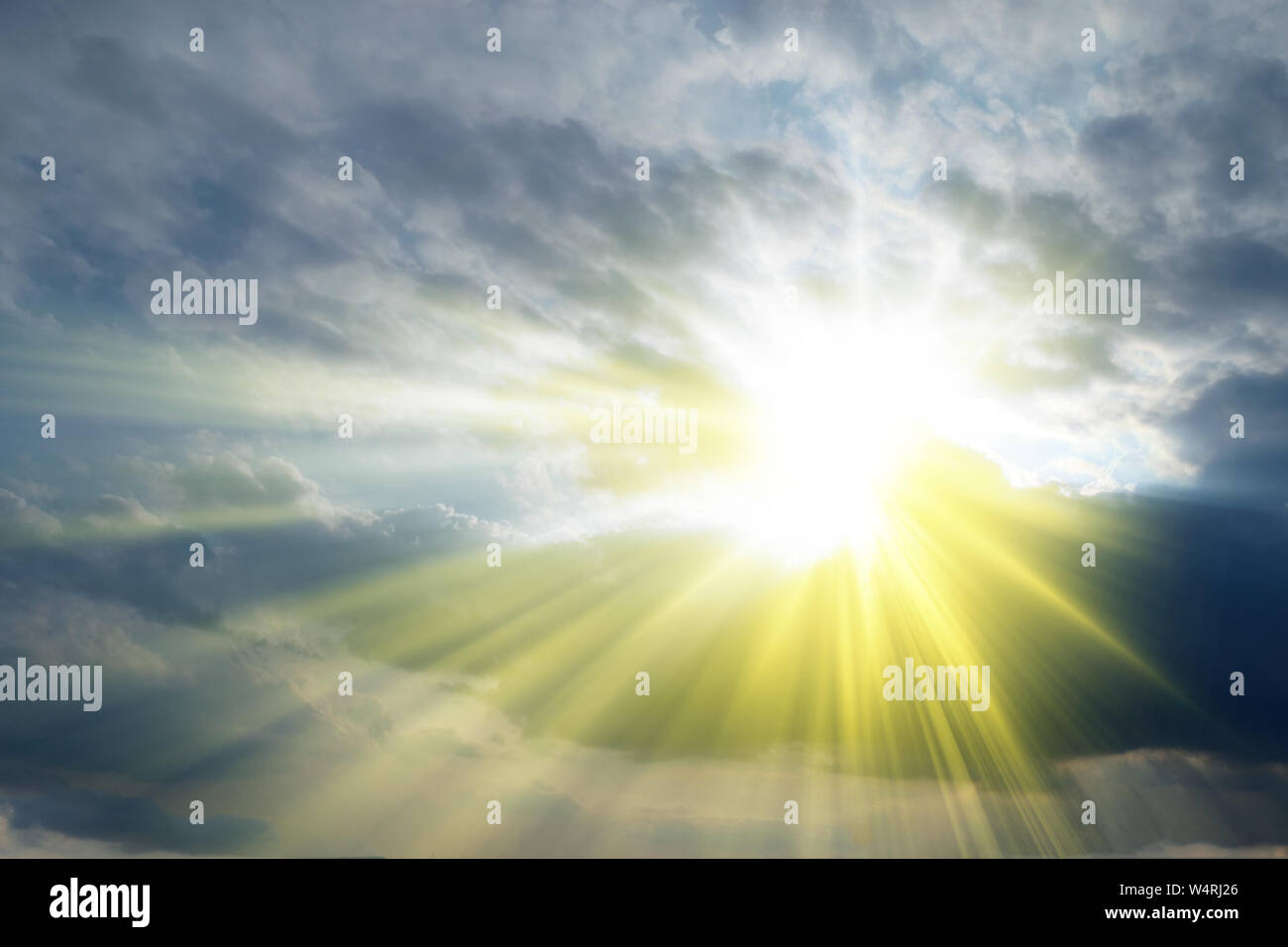 Sun rays sprouting through the clouds Paradise Stock Photo - Alamy