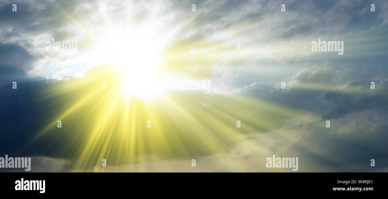 Sun rays sprouting through the clouds Paradise Stock Photo - Alamy