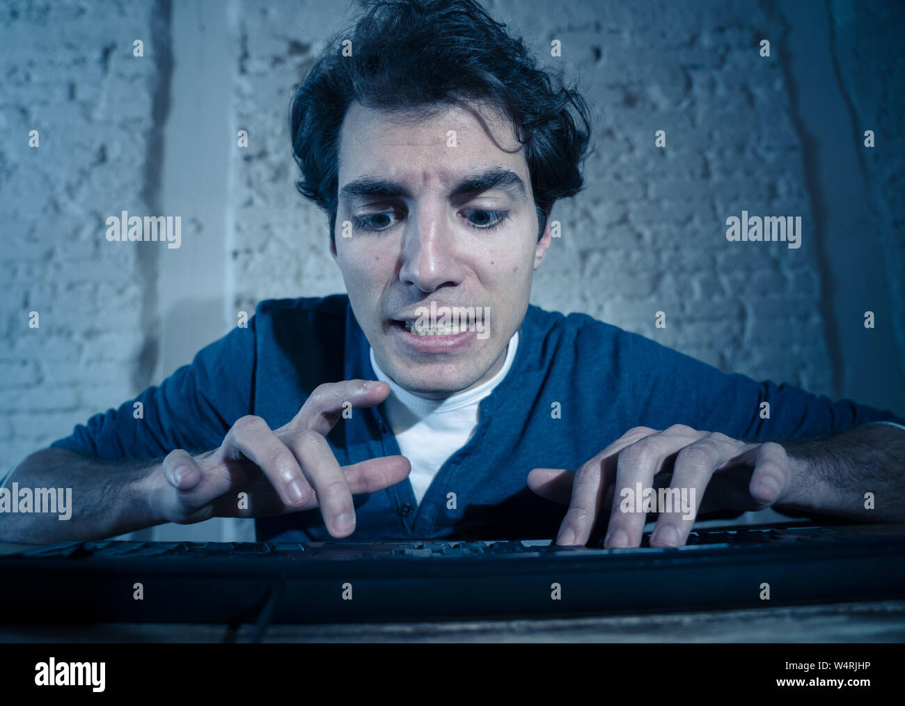 Man watching computer addiction hi-res stock photography and images - Alamy