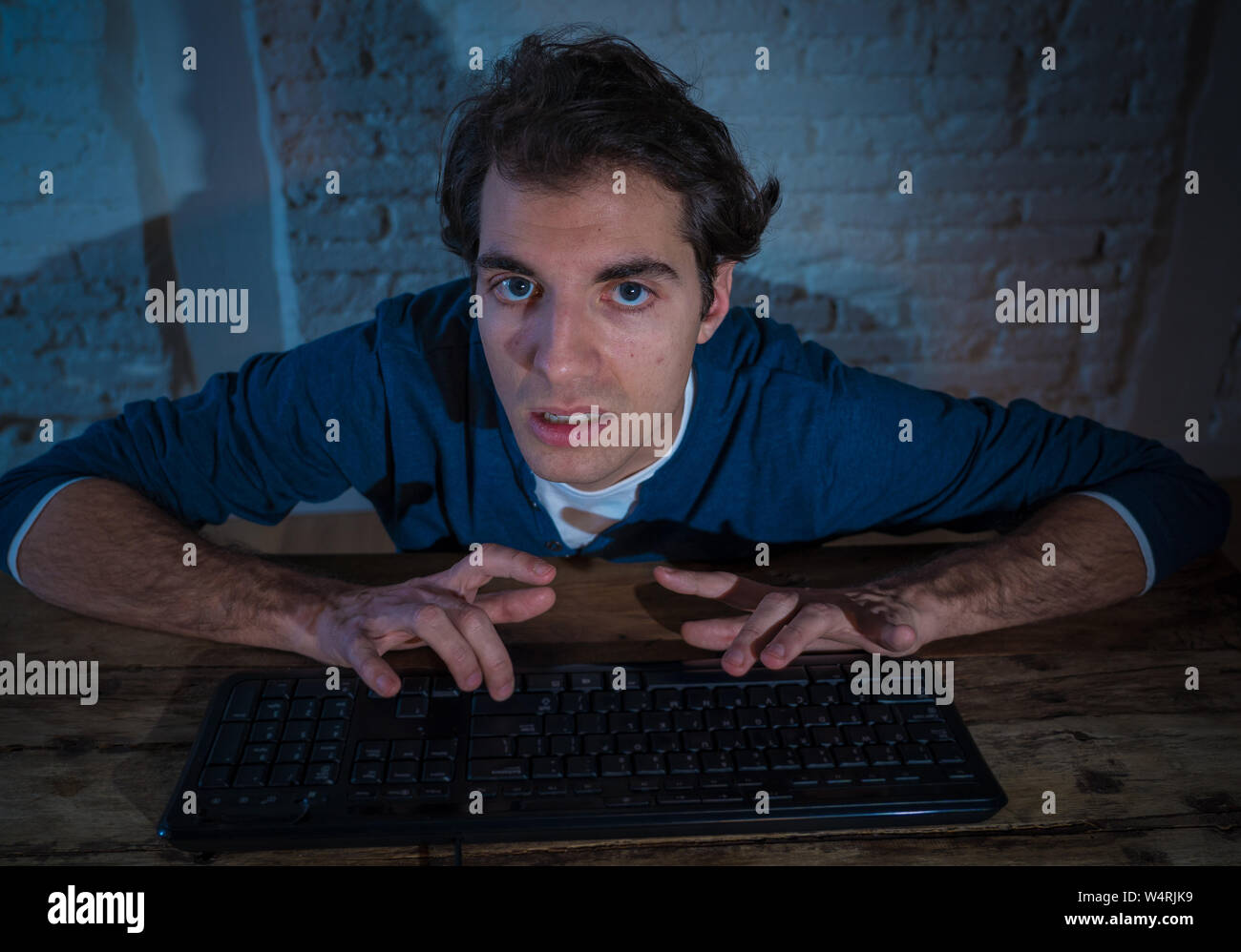 Sleepy man working on computer hi-res stock photography and images - Alamy